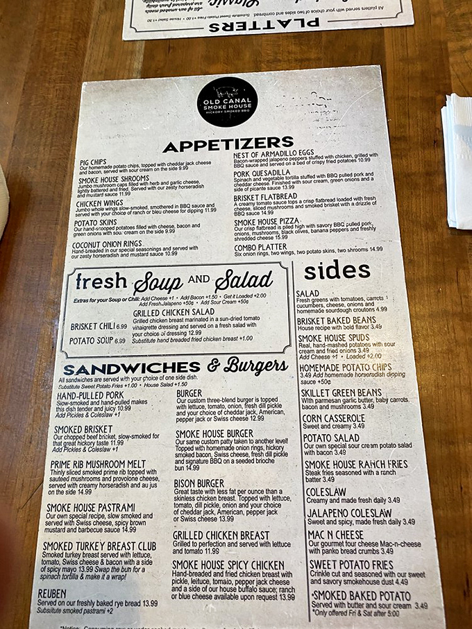 A menu that reads like poetry to meat lovers. Each description promises a journey through smoke and flavor that'll make your taste buds dance.