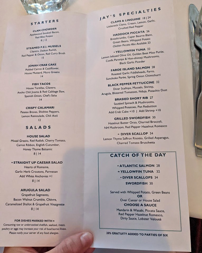 A menu that reads like poetry for seafood lovers. Each description promises a maritime adventure without requiring a captain's license.