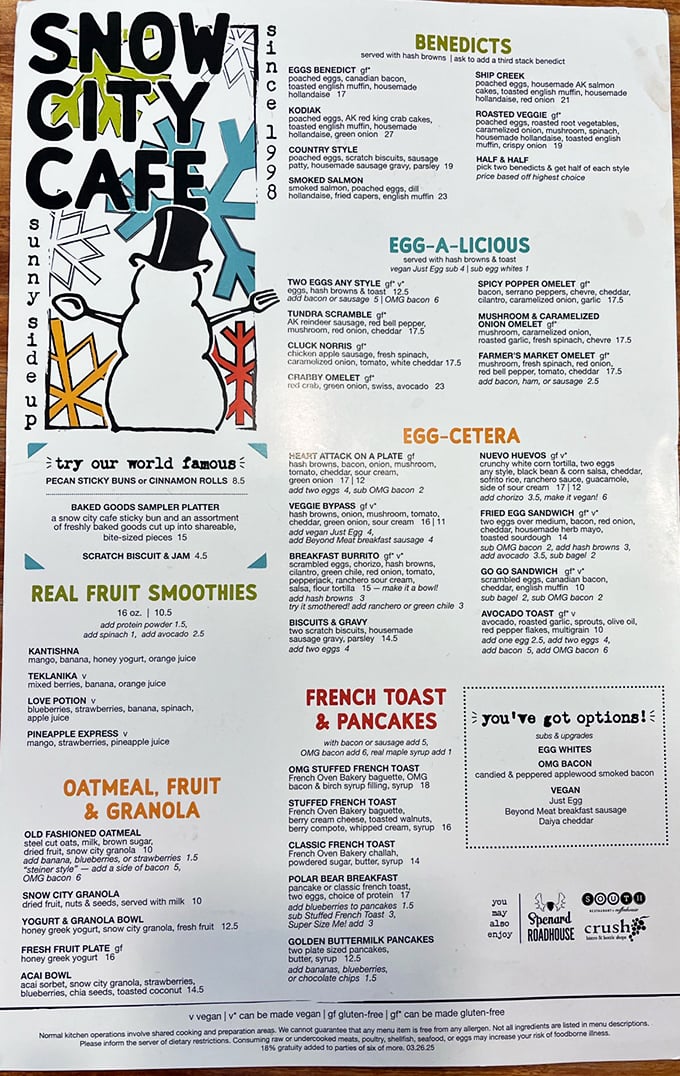 The menu reads like a love letter to breakfast, with sections like "Egg-A-Licious" and "OMG Stuffed French Toast" that make decision-making deliciously difficult.