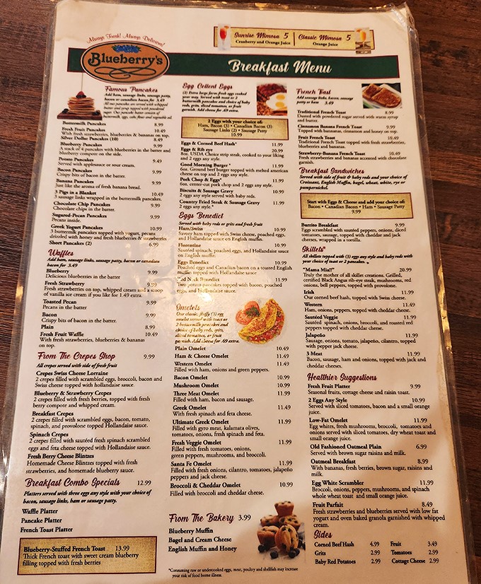 The menu reads like a love letter to the Chesapeake Bay. "Sneaky's Starters" is code for "order one of everything." 