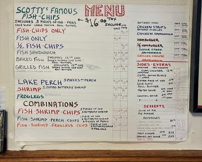 The handwritten menu board &ndash; a culinary time capsule that hasn't needed updating because perfection doesn't require revisions.