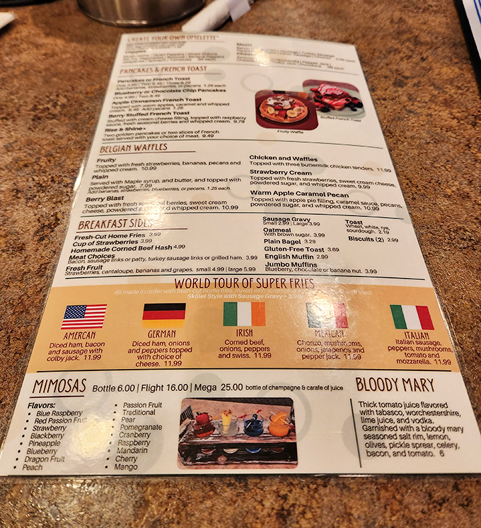The menu reads like a love letter to breakfast classics, with that "World Tour of Super Fries" section promising a passport-free culinary adventure.
