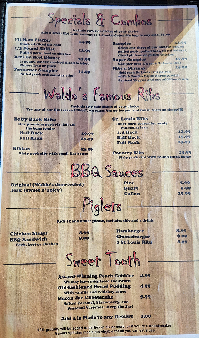 A menu that doesn't mince words&mdash;just meat. The "we may have misplaced the award" note about their peach cobbler tells you everything about their delightful humility.