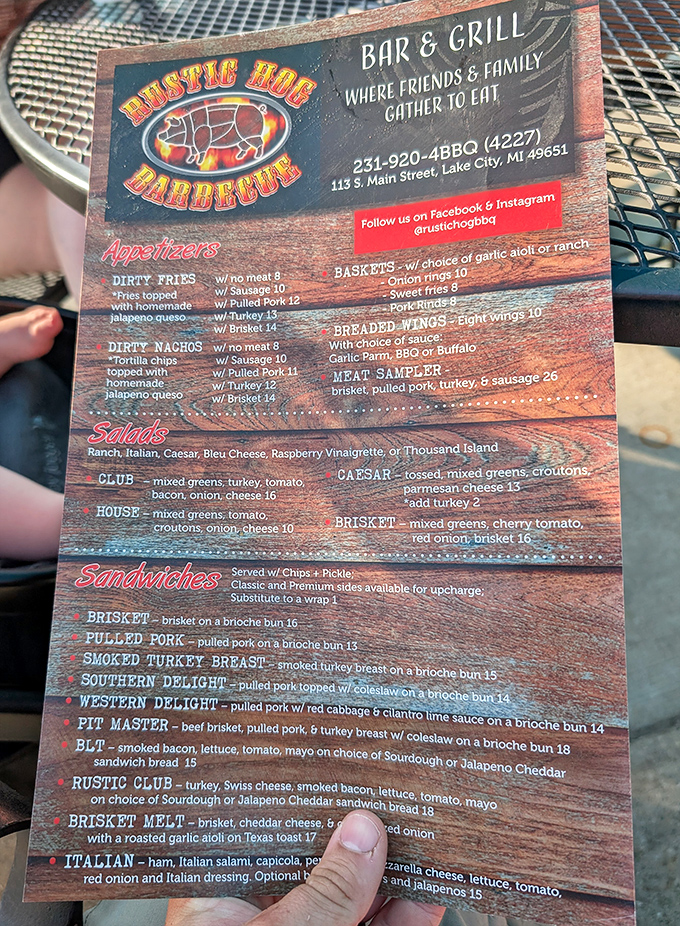 Menu treasure map! Each line promises a different journey into smoke-kissed paradise. The "Pit Master" sandwich is calling my name.