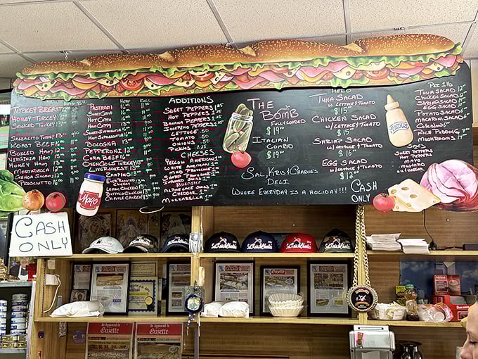 That giant sandwich illustration above the menu board isn't false advertising—it's a roadmap to your delicious destiny.