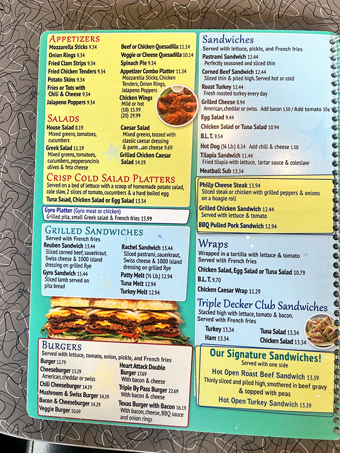 Red vinyl booths and vintage signage &ndash; the universal language of "sit down and stay awhile." Comfort begins before the food even arrives.