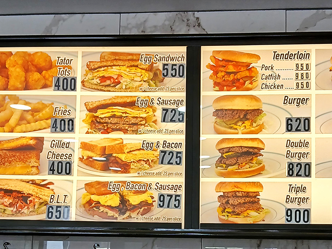 The menu board tells a simple story: this is a place that knows exactly what it does well, with the tenderloin sandwich as the undisputed star.