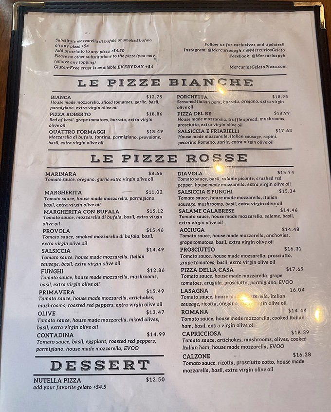 The menu reads like poetry for pizza purists &ndash; "Le Pizze Bianche" and "Le Pizze Rosse" promising authentic Neapolitan bliss.