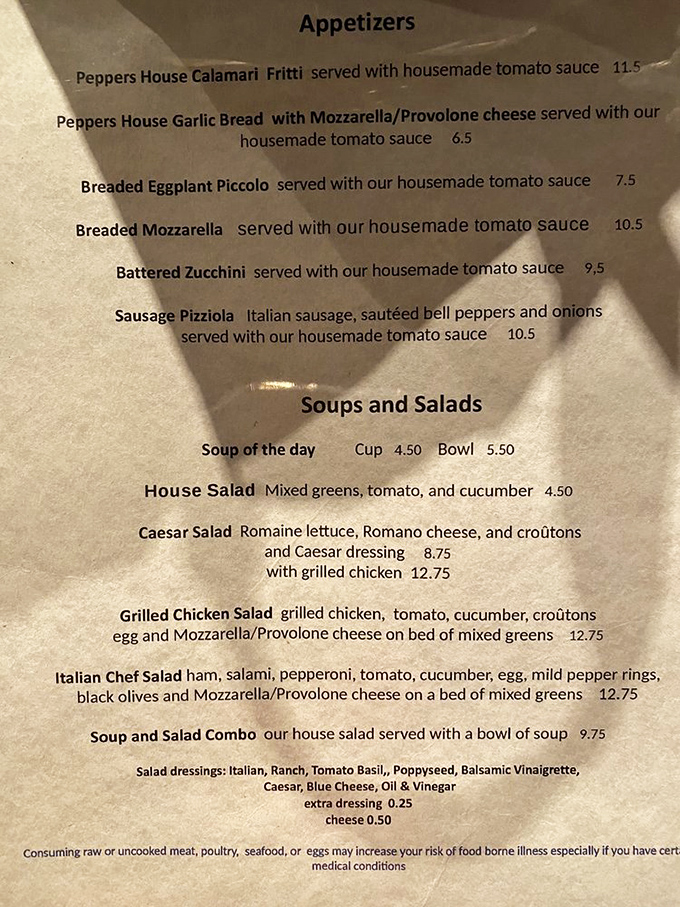 A menu where every other item seems to come with that legendary housemade tomato sauce. Reading it is like browsing a catalog of comfort food greatest hits.