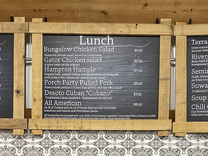The menu board tells you everything you need to know: these folks take sandwiches seriously, but themselves? Not so much.