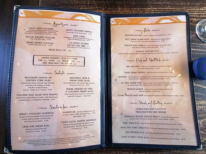 The menu reads like a love letter to the ocean – each dish a promise of coastal California's finest offerings, from crab cakes to cioppino.