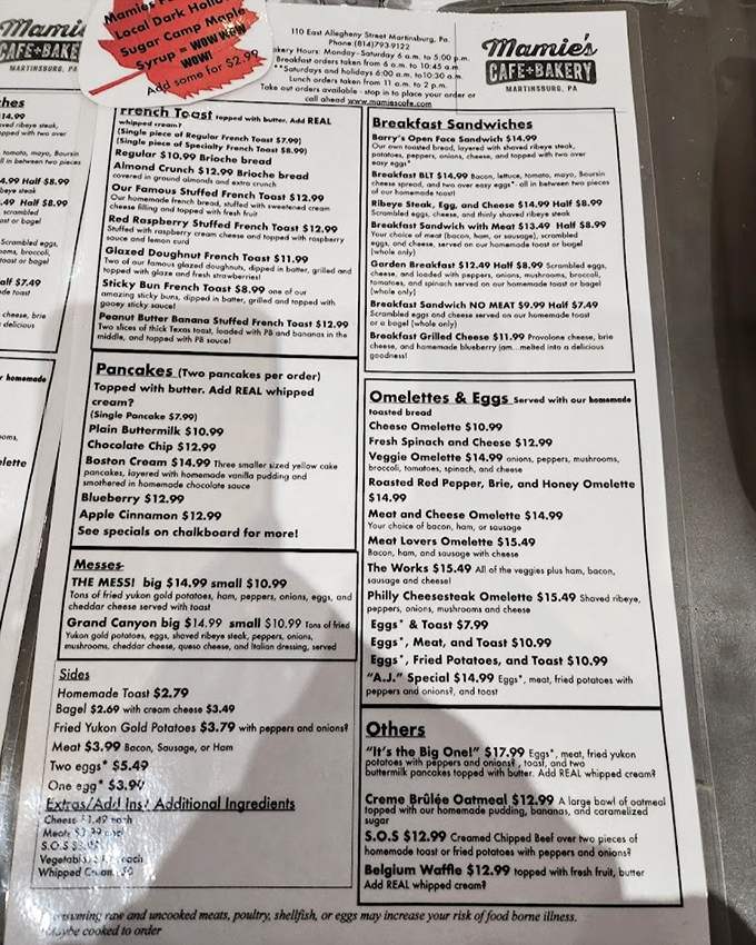 A menu that requires strategic planning and possibly a spreadsheet. The "Famous Stuffed French Toast" section alone deserves its own ZIP code.