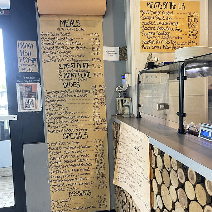 That menu board reads like a love letter to anyone who appreciates the art of smoke and time.