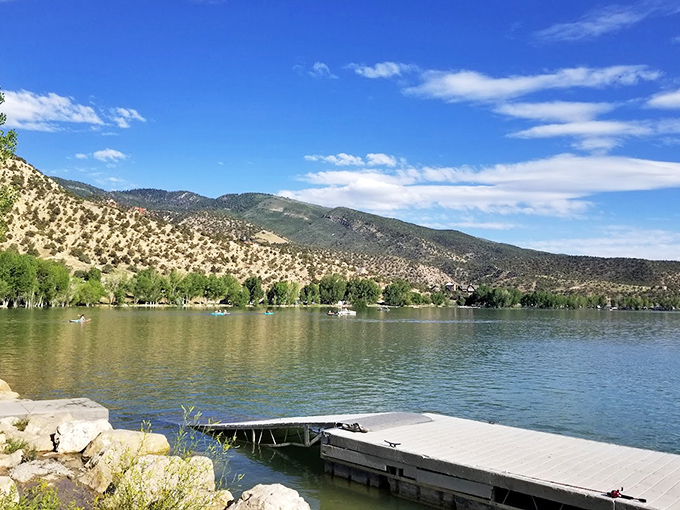 Where desert meets oasis in the most dramatic fashion possible. That wooden dock is practically begging you to jump in.