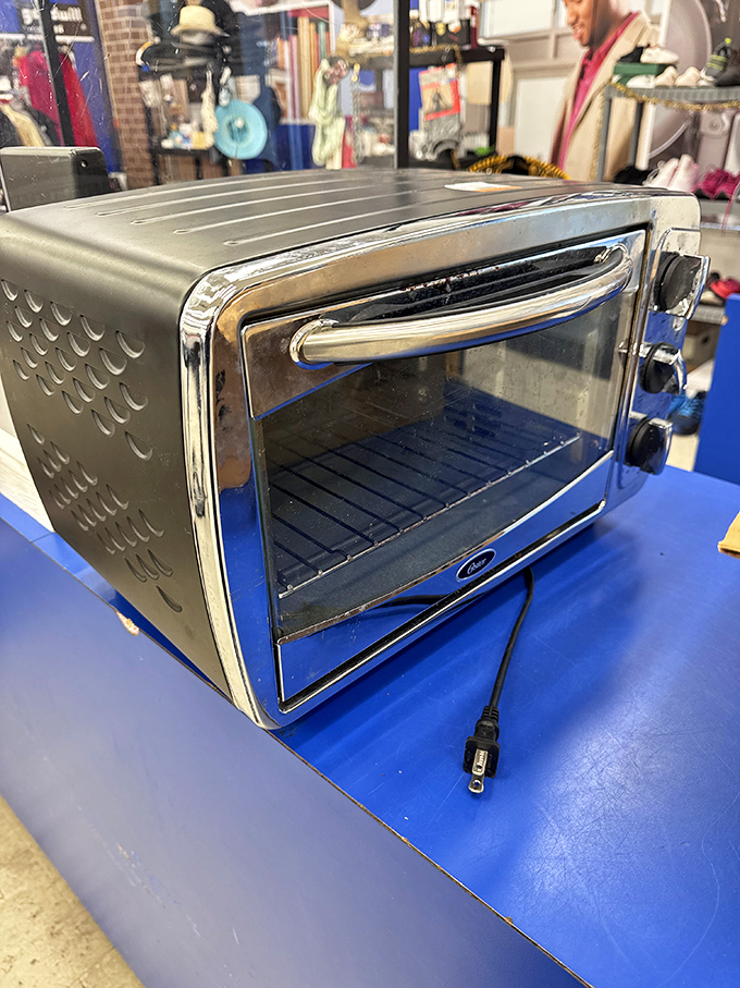 Someone's abandoned toaster oven is about to become another person's kitchen salvation. One man's appliance discard, another's bargain. 