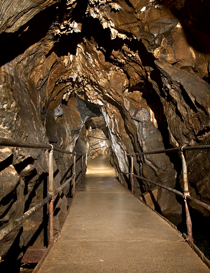 Follow the well-lit pathway deeper into the earth's secrets. Unlike most home renovation projects, this one's been in progress for 400 million years.