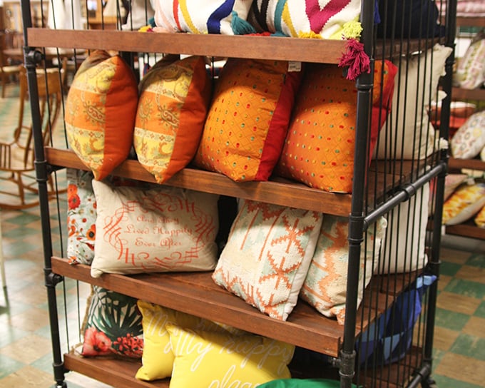 The pillow display that launched a thousand redecorating projects. These vibrant cushions are the secondhand equivalent of adopting puppies&mdash;impossible to choose just one.