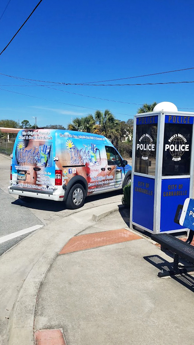 Even colorful Florida tourism vans stop to pay respects to this diminutive defender of the peace. Talk about a traffic-stopping attraction!