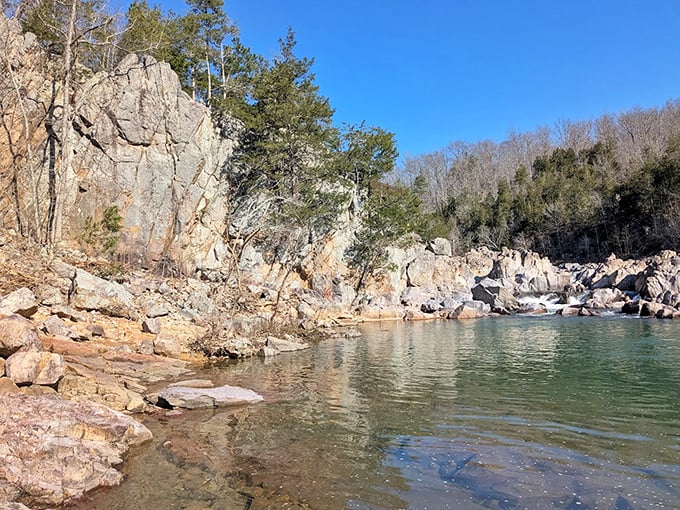Crystal-clear waters reflect the rugged beauty of the St. Francois Mountains. This tranquil pool offers a moment of serenity amid the park's geological wonders.