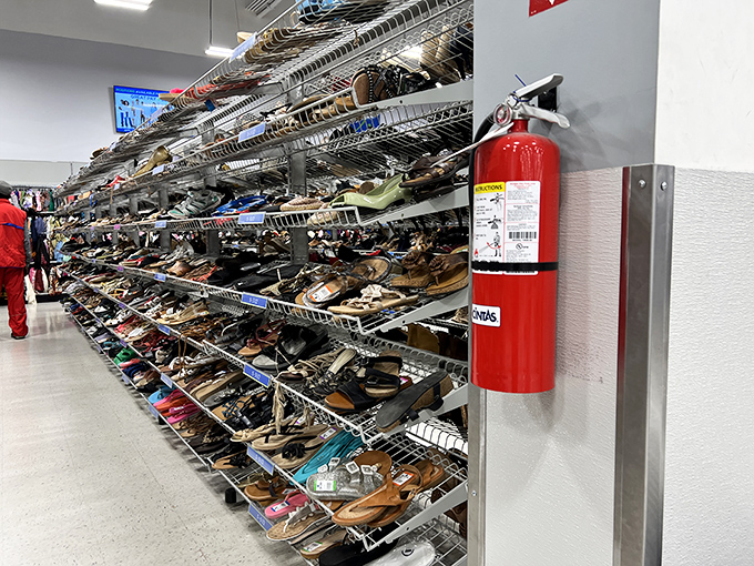The shoe wall of dreams! Like a well-organized library of footwear where every pair tells a story of previous adventures.