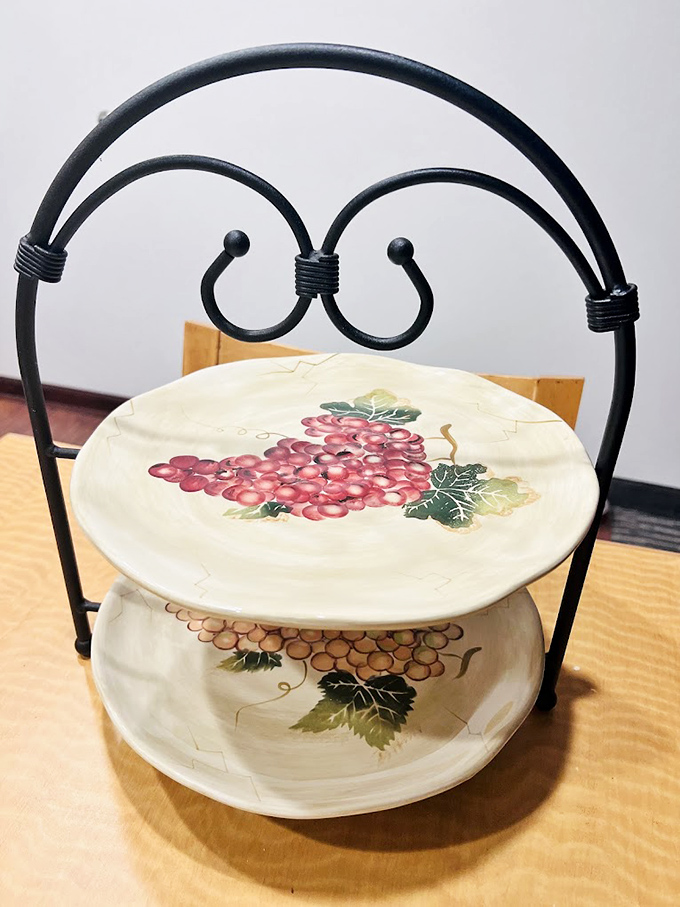 This two-tiered grape-adorned serving stand whispers of dinner parties past and brunches future&mdash;all for less than a fancy coffee.