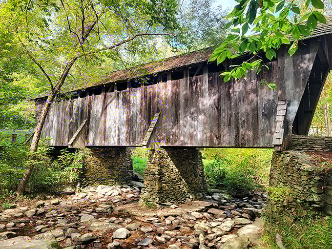 From this angle, you can appreciate how the stone pillars and wooden structure work together in perfect harmony&mdash;architectural poetry spanning the gentle waters below.
