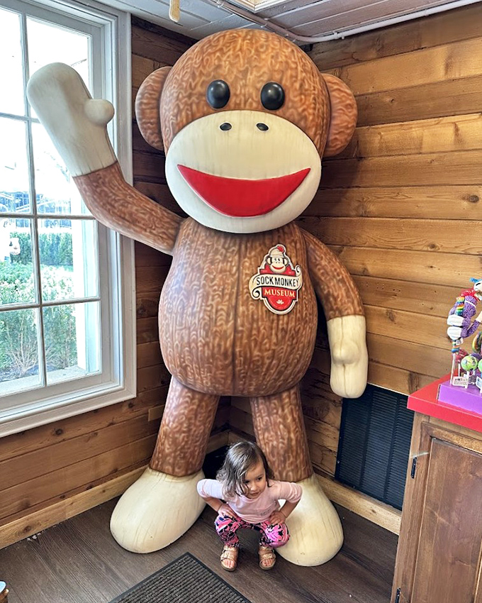 Size matters when it comes to sock monkeys. This gentle giant stands guard, offering high-fives to visitors both young and old.