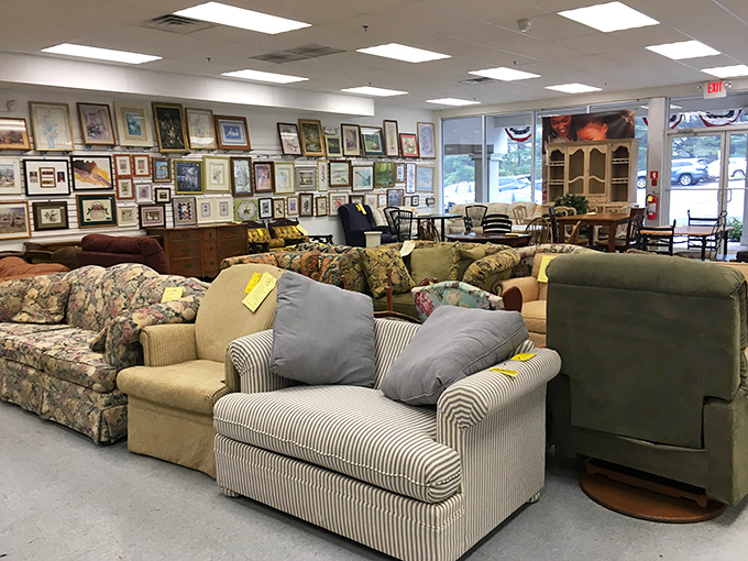 The sofa section: where floral patterns from three decades collide and somehow, someone will find exactly what their living room was missing.