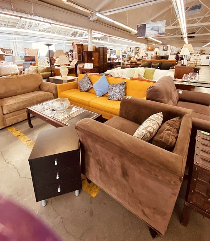 The living room showroom—where that statement mustard sofa is practically begging to star in your next "after" photo on social media.