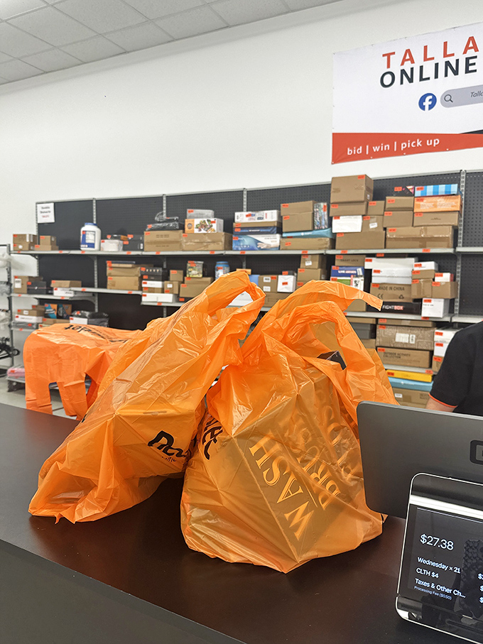 Those bright orange bags aren't just carrying merchandise; they're holding fashion freedom that didn't require a second mortgage.