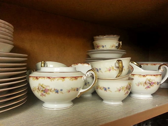 Delicate floral teacups waiting for their second act. One person's forgotten china is another's perfect Mad Hatter tea party centerpiece.