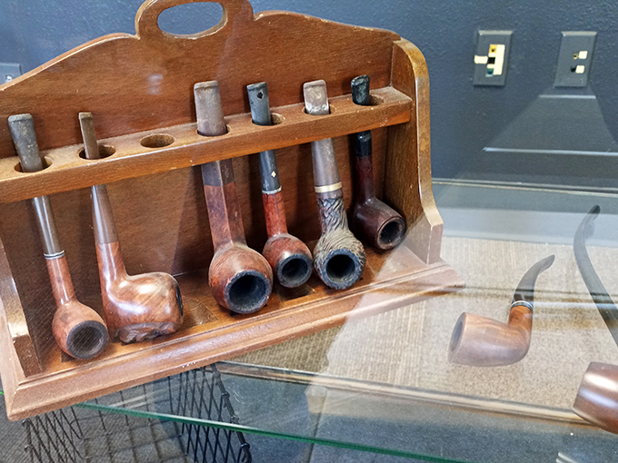 Grandpa's pipe collection? No, just another day's discoveries at The Arc. Each briar bowl holds stories of contemplative evenings past.
