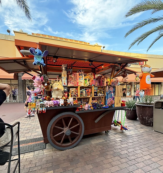 This charming vendor cart offers a colorful oasis of toys and trinkets between shopping sprees&mdash;because sometimes the best souvenirs aren't from the big stores.