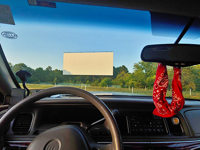 The best seat in the house? Your own car. This windshield view offers front-row access to blockbuster entertainment with personal climate control included.