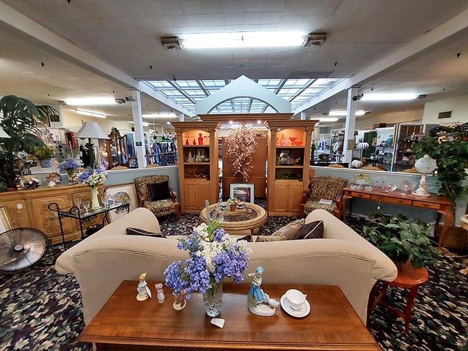 Not just furniture, but conversation pieces. This living room vignette feels like it's waiting for guests from another era to arrive.