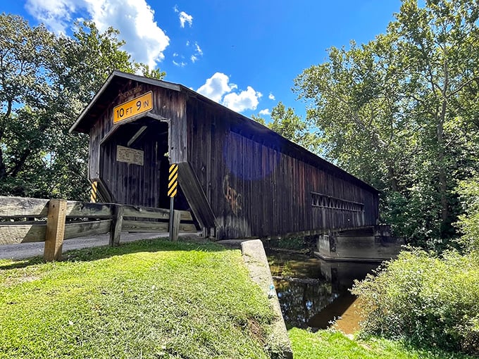 That yellow clearance sign is the bridge's way of saying, "Duck if you're taller than a horse and buggy!" Modern meets historic.