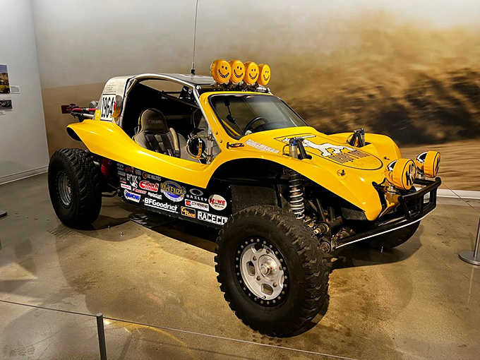 The cheerful yellow dune buggy grins with its headlight "eyes," ready for sandy adventures. Those smiley-face lights aren't just decoration&mdash;they're a mood you can drive.