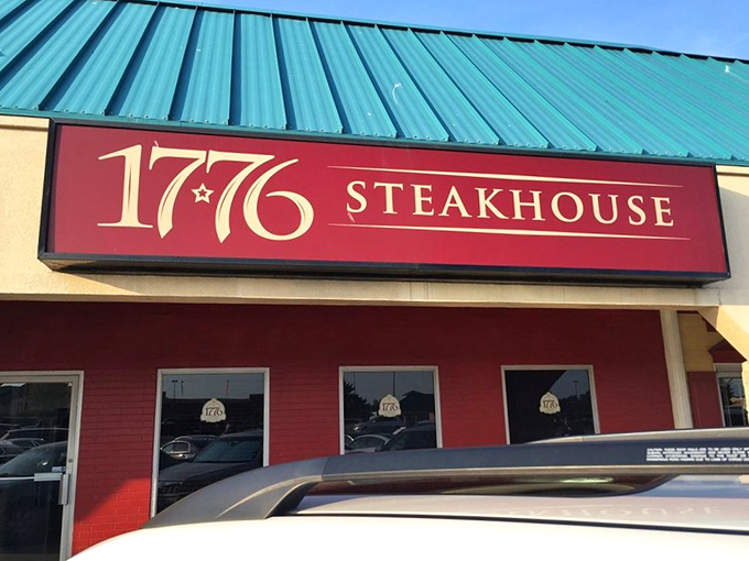 1776 Steakhouse declares independence from boring meals with its bold red facade and revolutionary approach to beef.