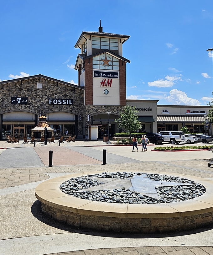 This tower of brand names rises like a beacon for bargain hunters, promising everything from athletic wear to designer finds.