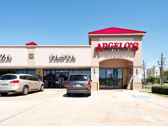 Angelo's bright red sign promises Italian comfort in suburban Webster. Sometimes the best pizza hides in plain sight.