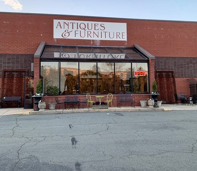 Antiques & Furniture spelled out in elegant letters &ndash; a humble introduction to Greensboro's not-so-humble collection of timeless treasures.