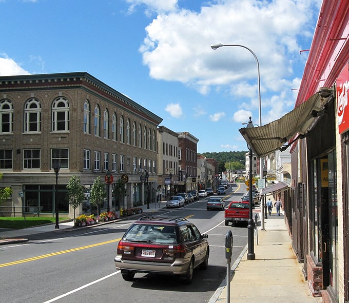 Athol's impressive red brick mill building stands tall against the blue sky, a monument to the town's industrious past.