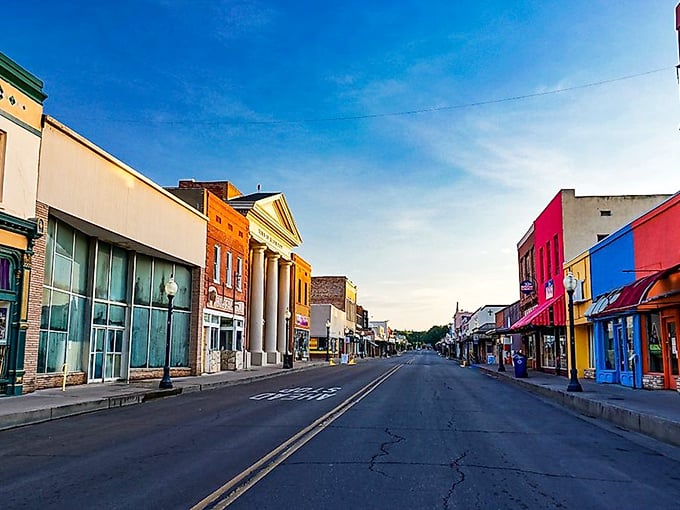 Aurora's main street stretches like a rainbow-colored welcome mat, inviting you to slow down and stay awhile.