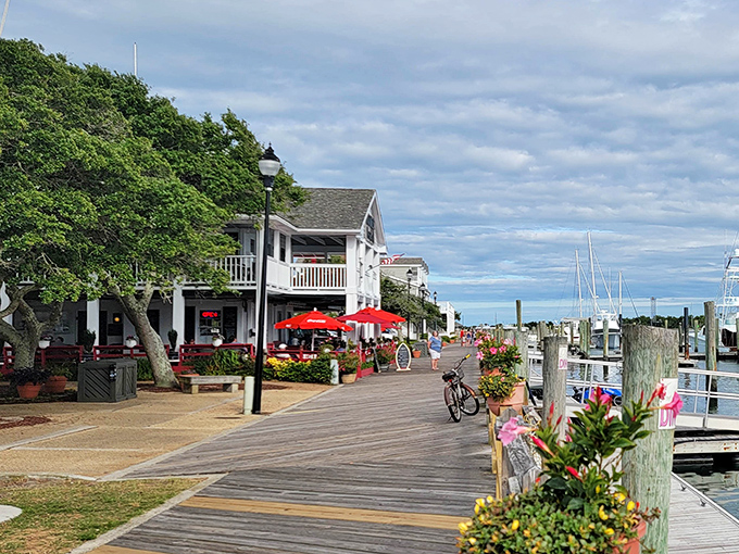 Waterfront dining never looked so inviting - those red umbrellas are practically waving you over for lunch.