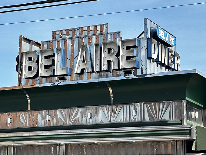 That vintage "Bel Aire Diner" sign is like a time machine to when breakfast was pure art.