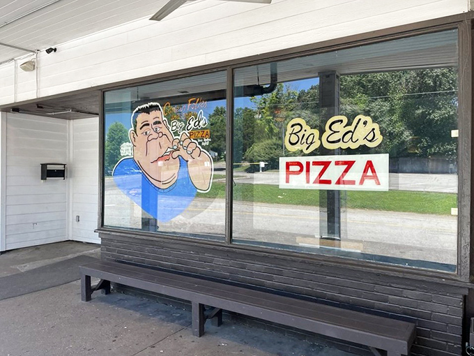 Big Ed's cartoon mascot grins like he knows exactly what delicious secrets await you inside.