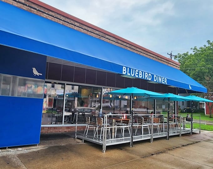 Blue as a perfect Iowa sky, this diner screams "classic American breakfast" louder than a rooster at dawn.