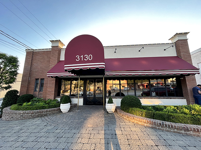 Bones Restaurant: "That burgundy awning isn't just decoration&mdash;it's a beacon for steak lovers. Like a red carpet leading to beef paradise."