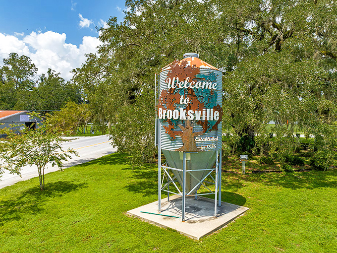 Brooksville's welcome sign stands tall among the trees &ndash; like a friendly neighbor saying "Your retirement dollars stretch nicely here!"