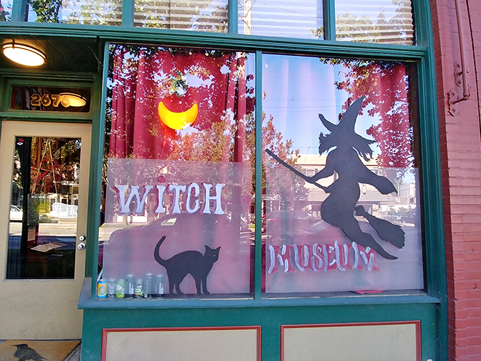 Step into the mysterious world of witchcraft at this unassuming storefront. That silhouette definitely isn't riding a vacuum cleaner!
